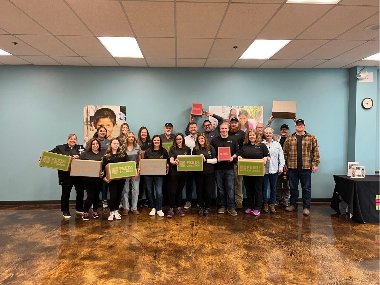 Building Better Together Committee Packs 12,000 Pounds of Food for Feed ...